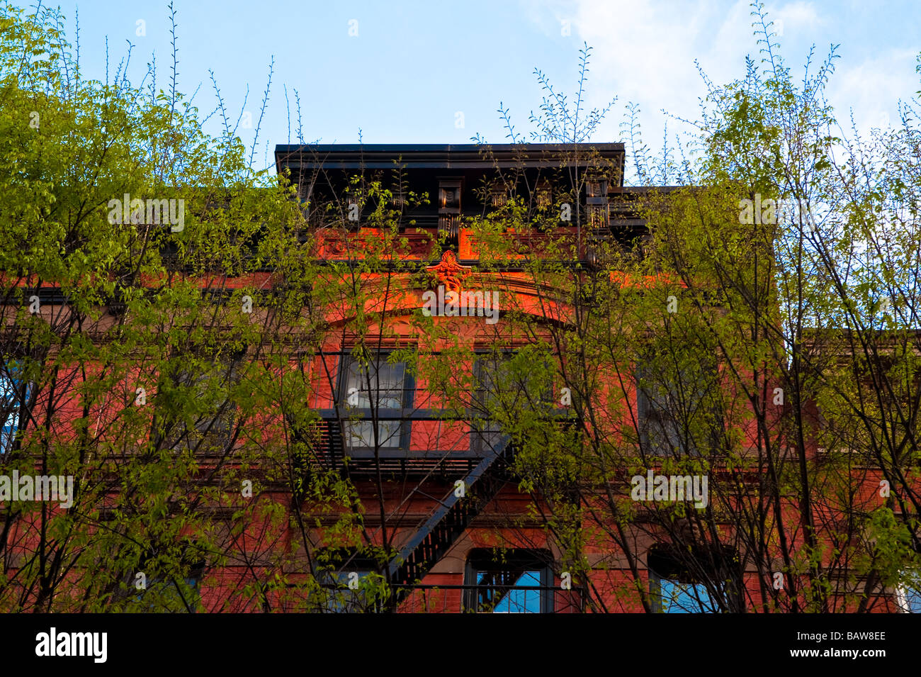 Old brick apartment building in a big city Stock Photo - Alamy