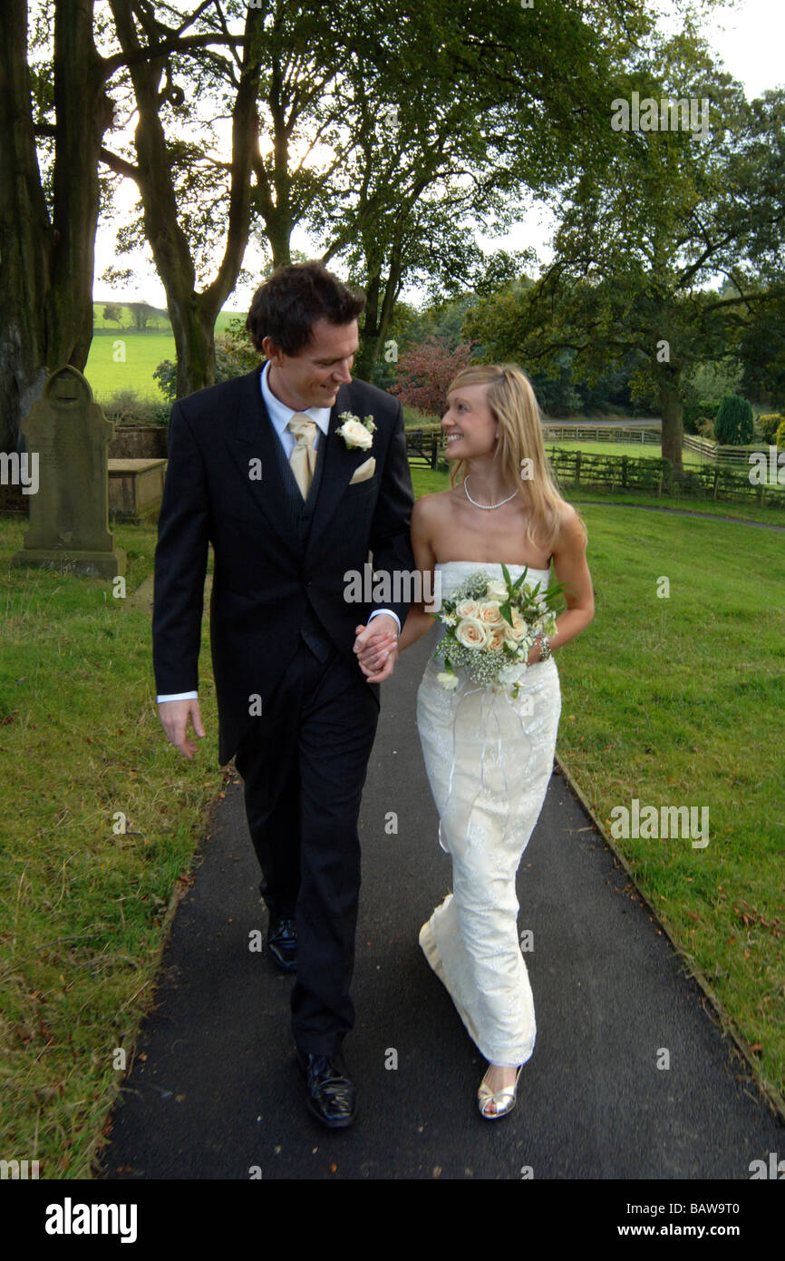 Young couple of newly weds just married at the church, North Yorkshire ...