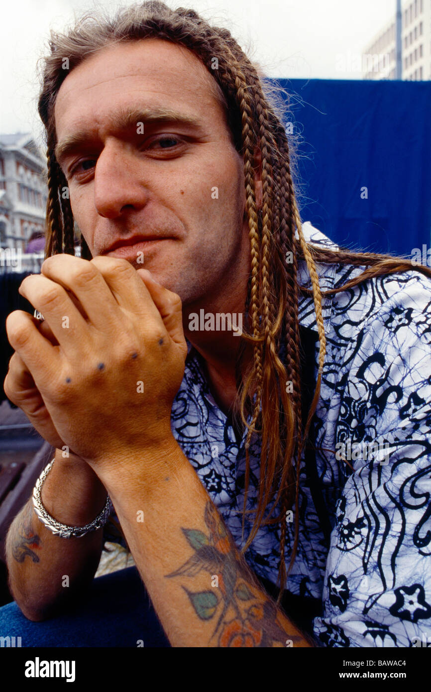 Christchurch New Zealand Barrow Boy With Hair Braids & Tattoos Stock ...