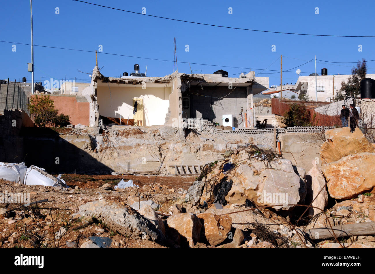 A half demolished house in the Palestinian neighborhood of Beit Hanina ...