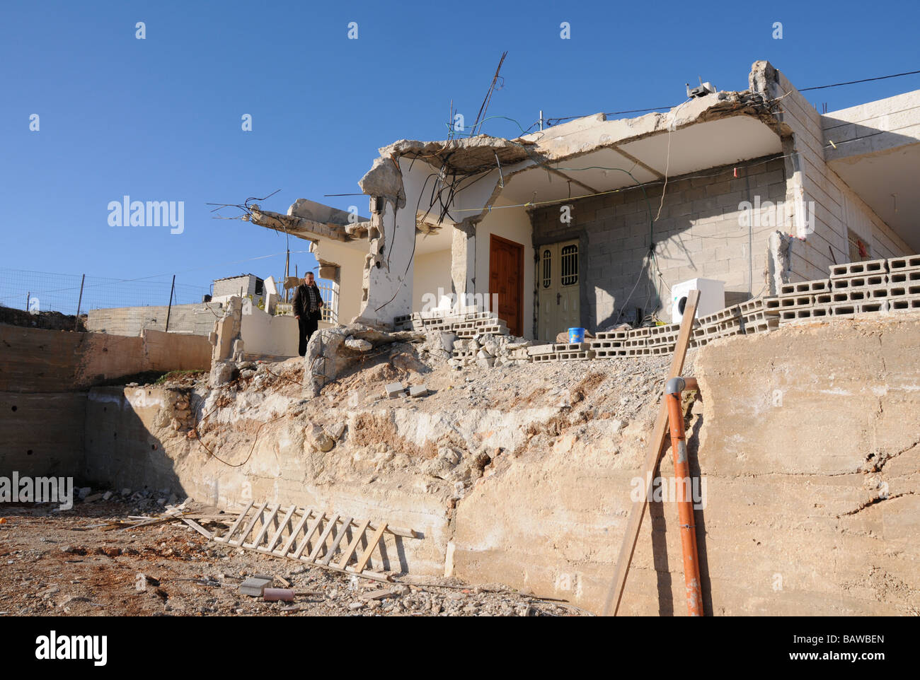 A half demolished house in the Palestinian neighborhood of Beit Hanina ...