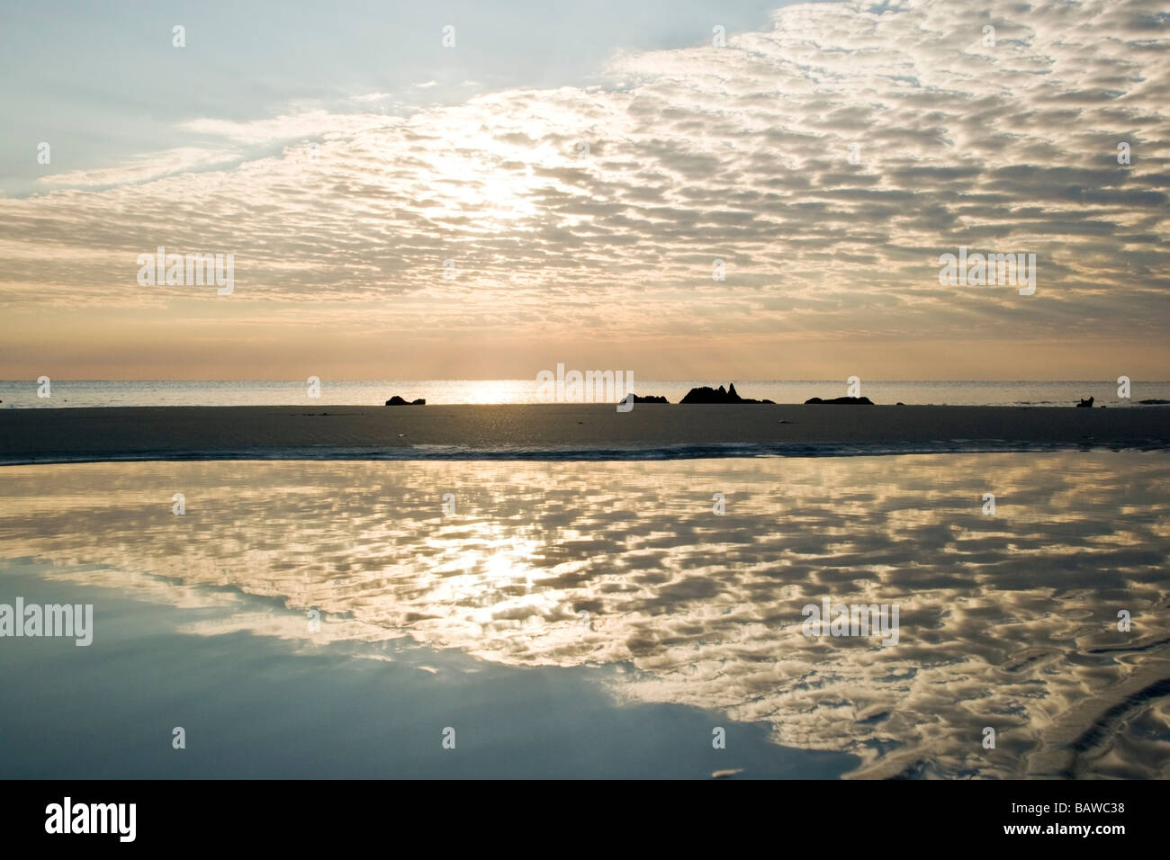 Sunrise and tidal pool reflections on Driftwood Beach - Jekyll Island ...
