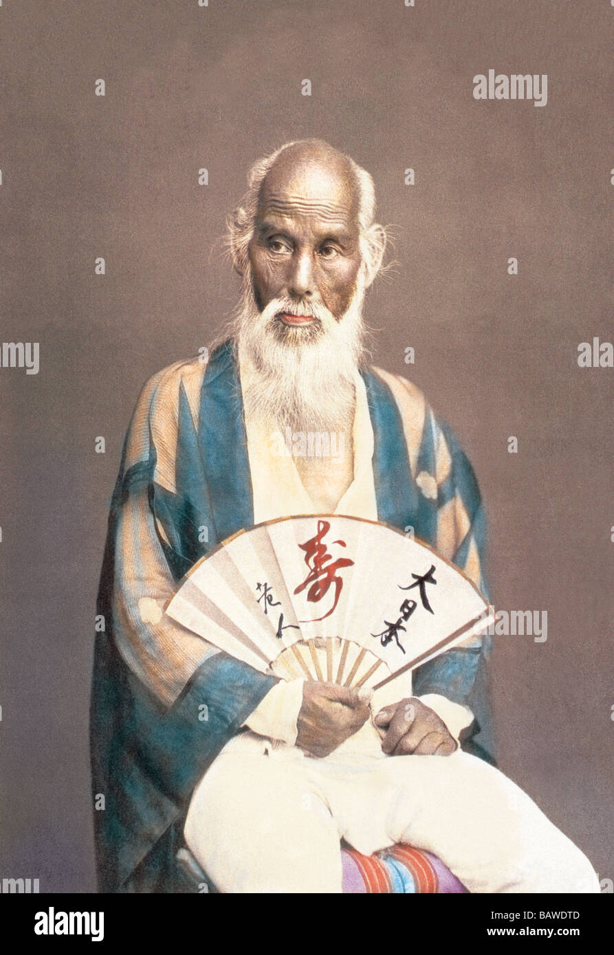 Old Man with a Fan Stock Photo - Alamy