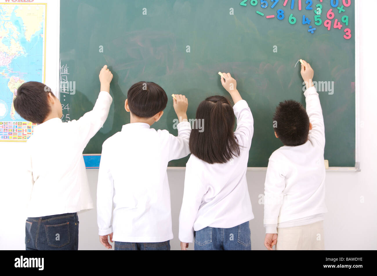 Children Writing On Blackboard High Resolution Stock Photography and ...