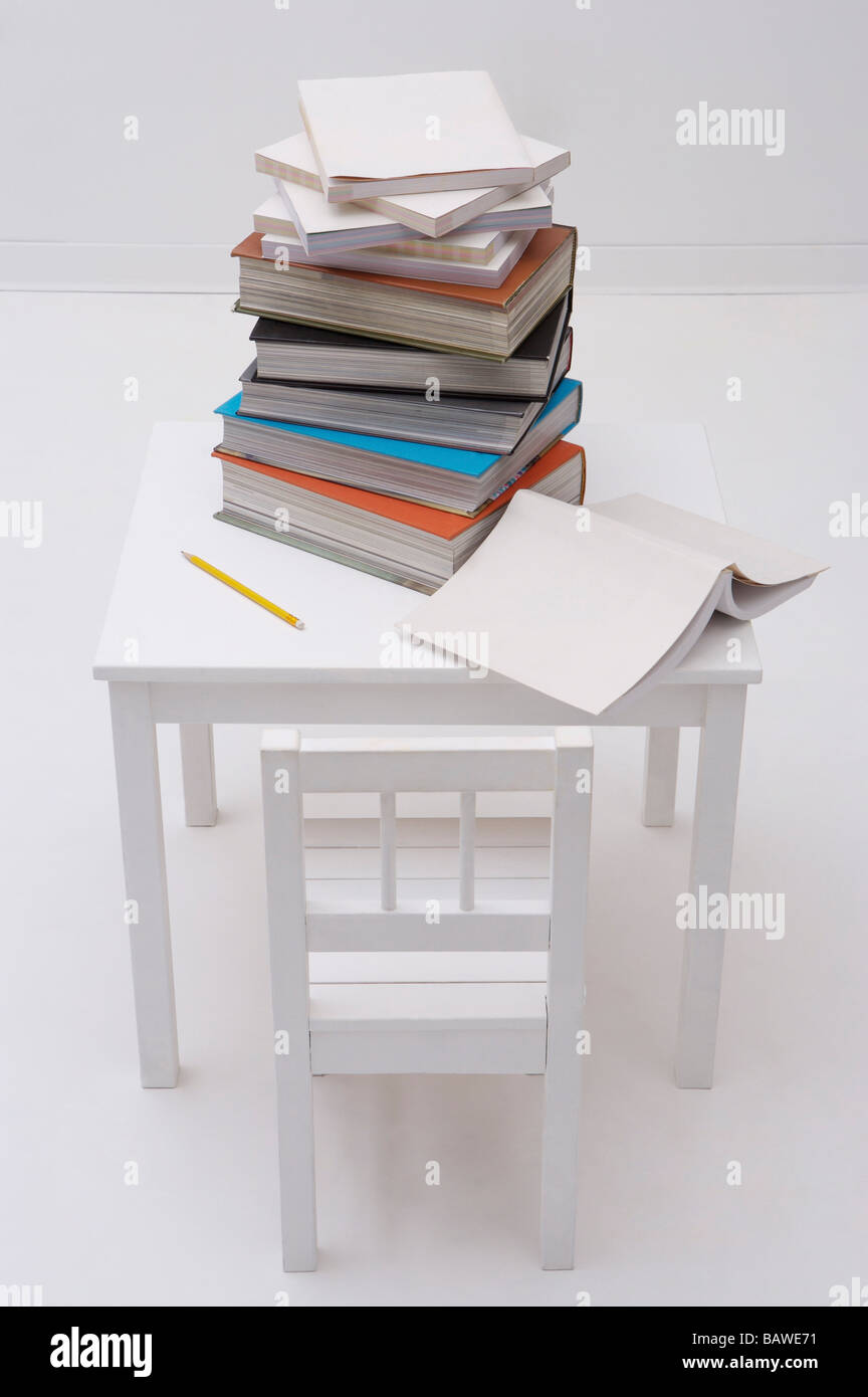 Books and pencil on chair hi-res stock photography and images - Alamy