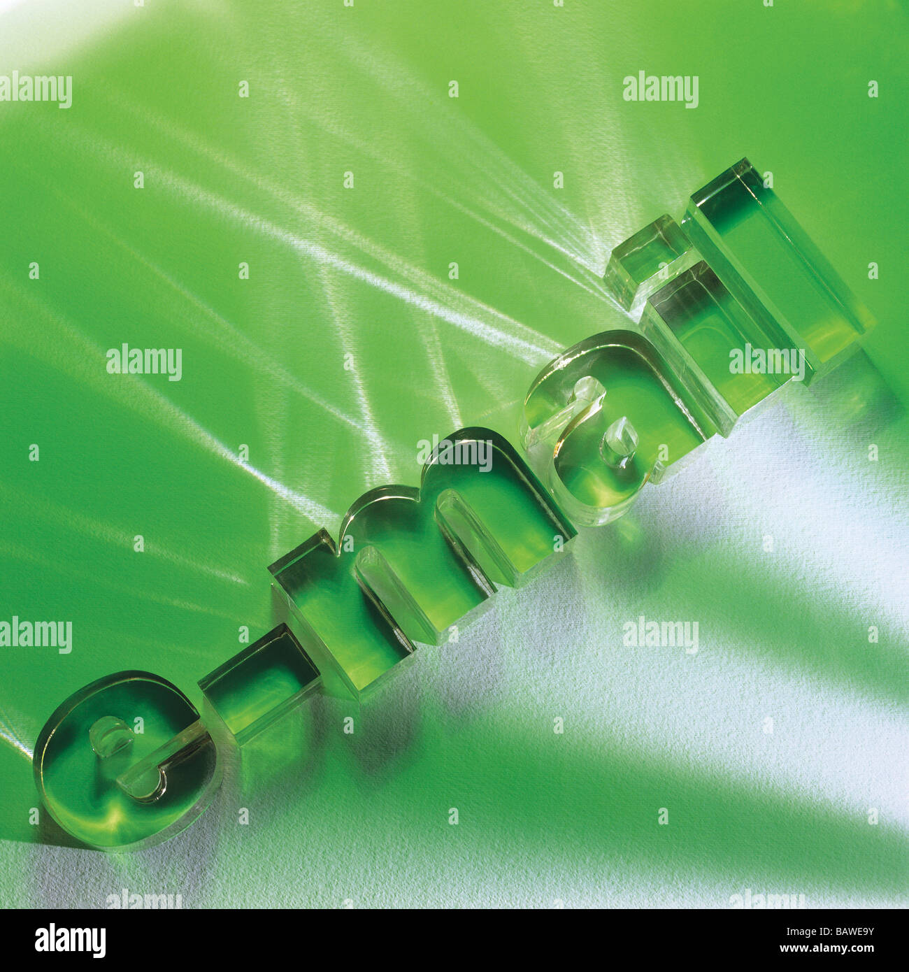 Green laser beam on the word e mail Stock Photo - Alamy