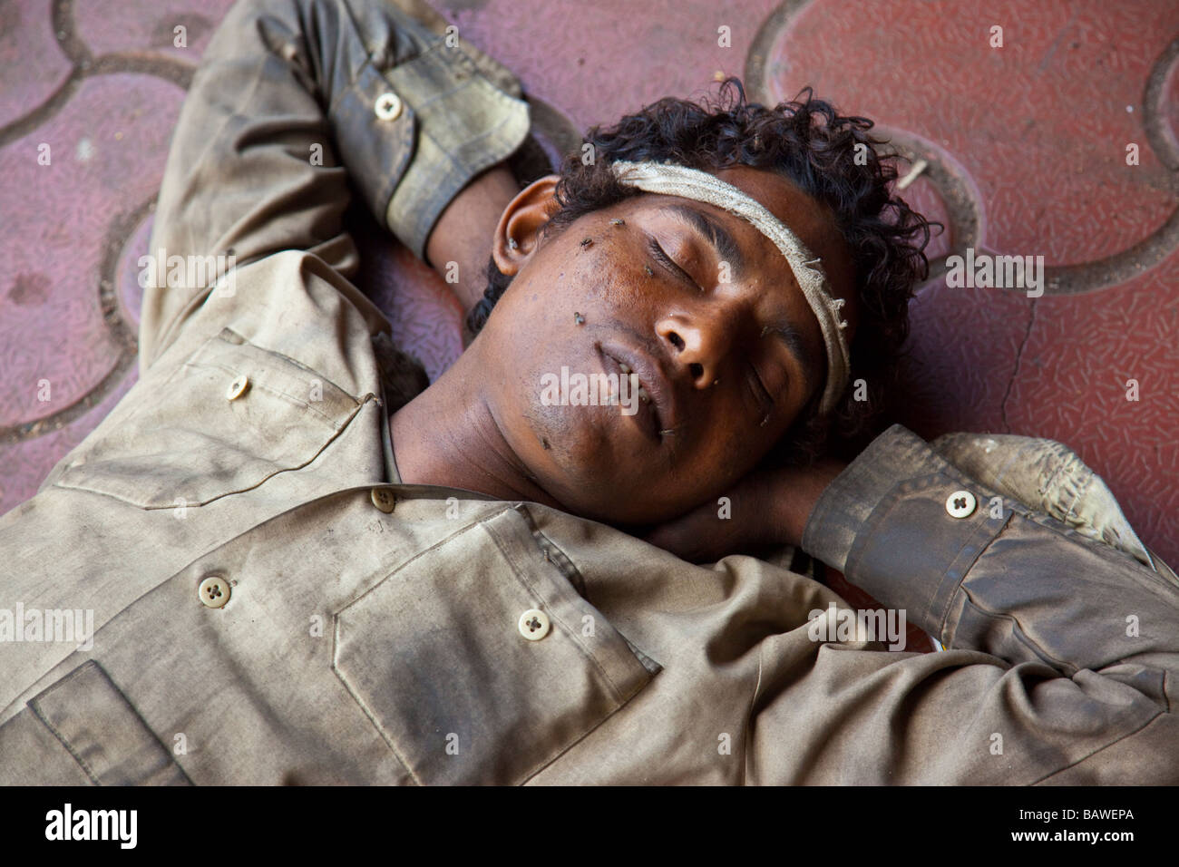 Homeless child sleeping on street hi-res stock photography and images ...