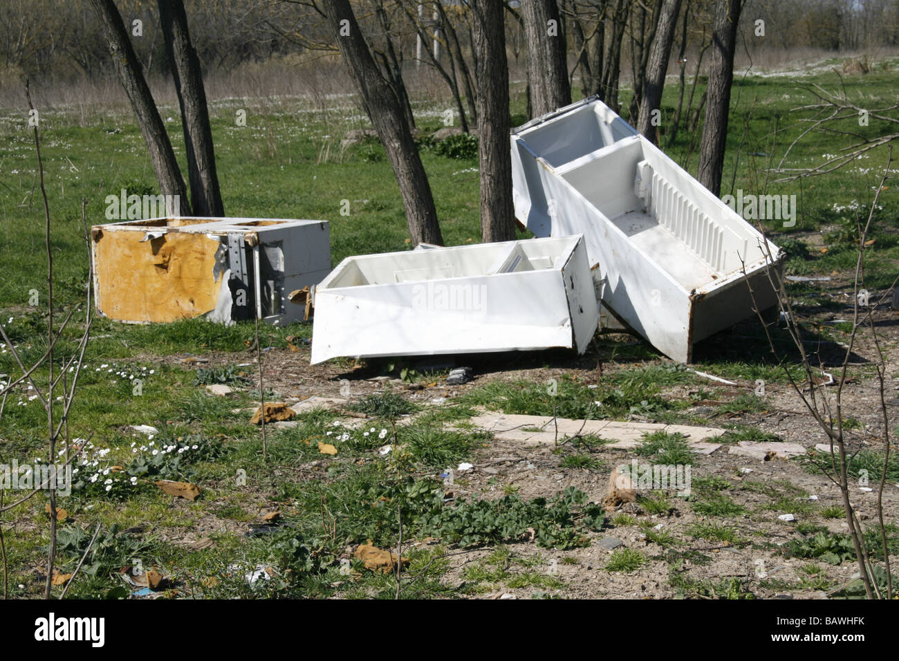 old fridge freezers dumped in field in countryside Stock Photo - Alamy