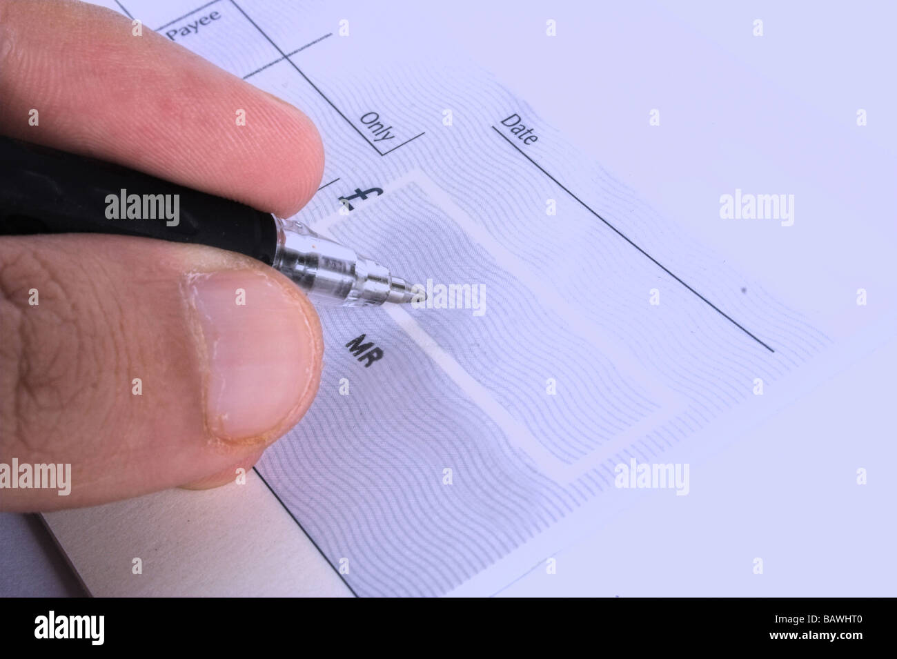 signing a cheque Stock Photo - Alamy