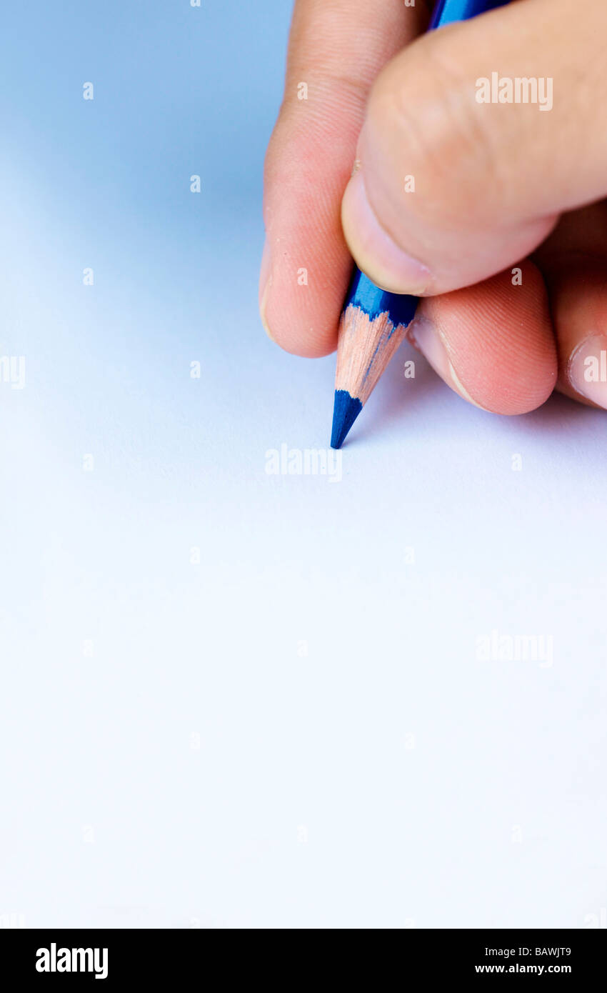 drawing with a blue colour pencil Stock Photo - Alamy