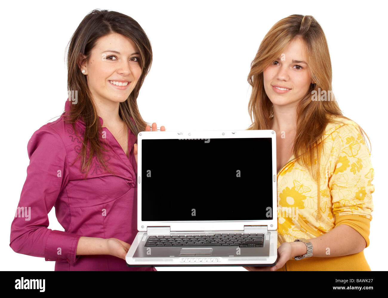 girls displaying a laptop computer Stock Photo - Alamy