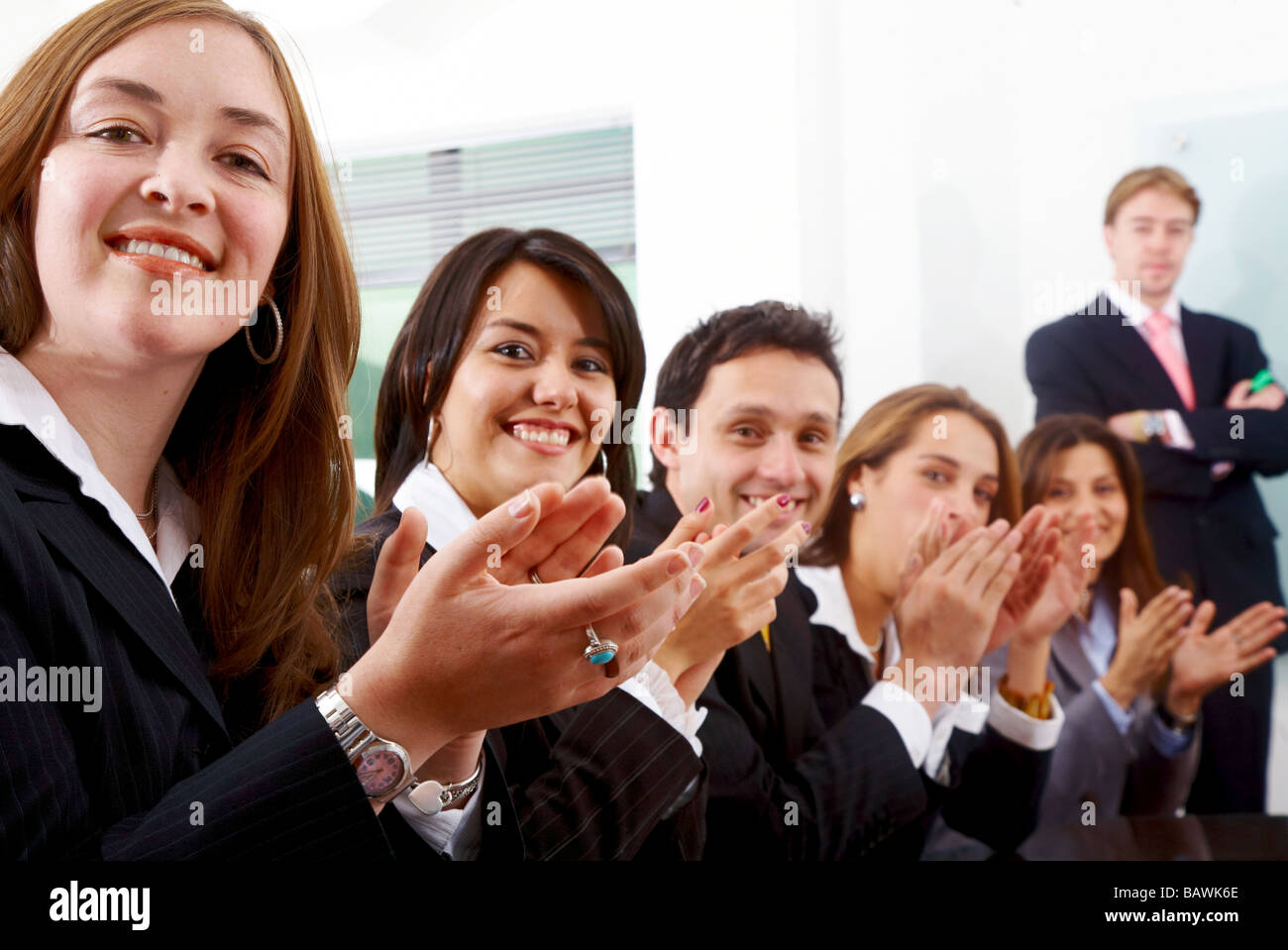 business team clapping Stock Photo - Alamy