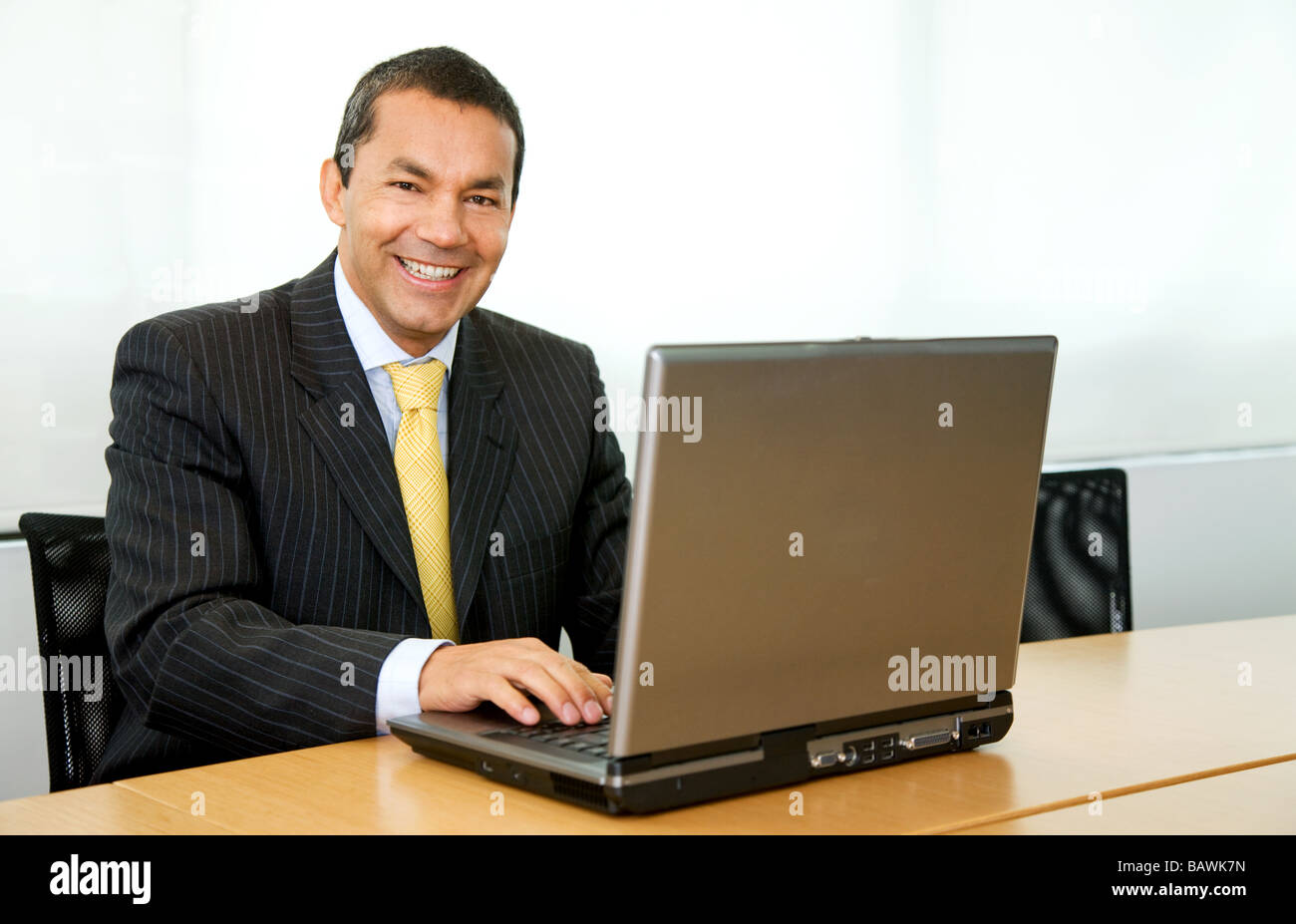 business man on a laptop computer Stock Photo - Alamy