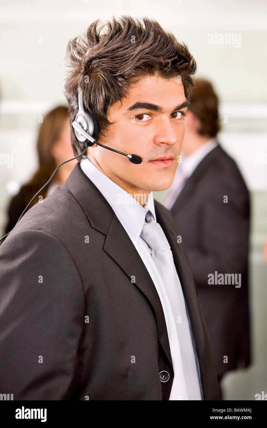 Friendly male customer services representative hi-res stock photography ...