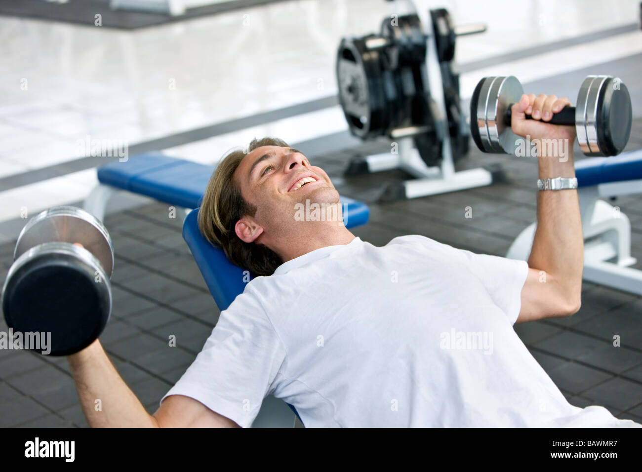 man lifting weights Stock Photo - Alamy
