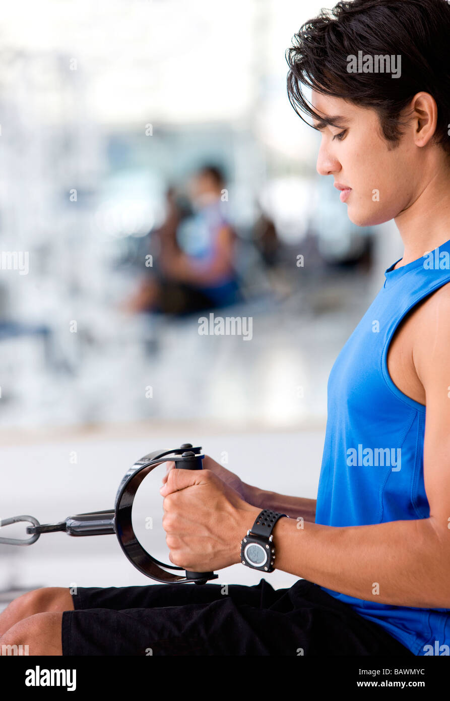 Man exercising at the gym Stock Photo - Alamy