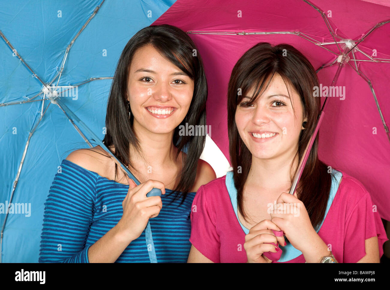 happy sisters - funky colours Stock Photo - Alamy