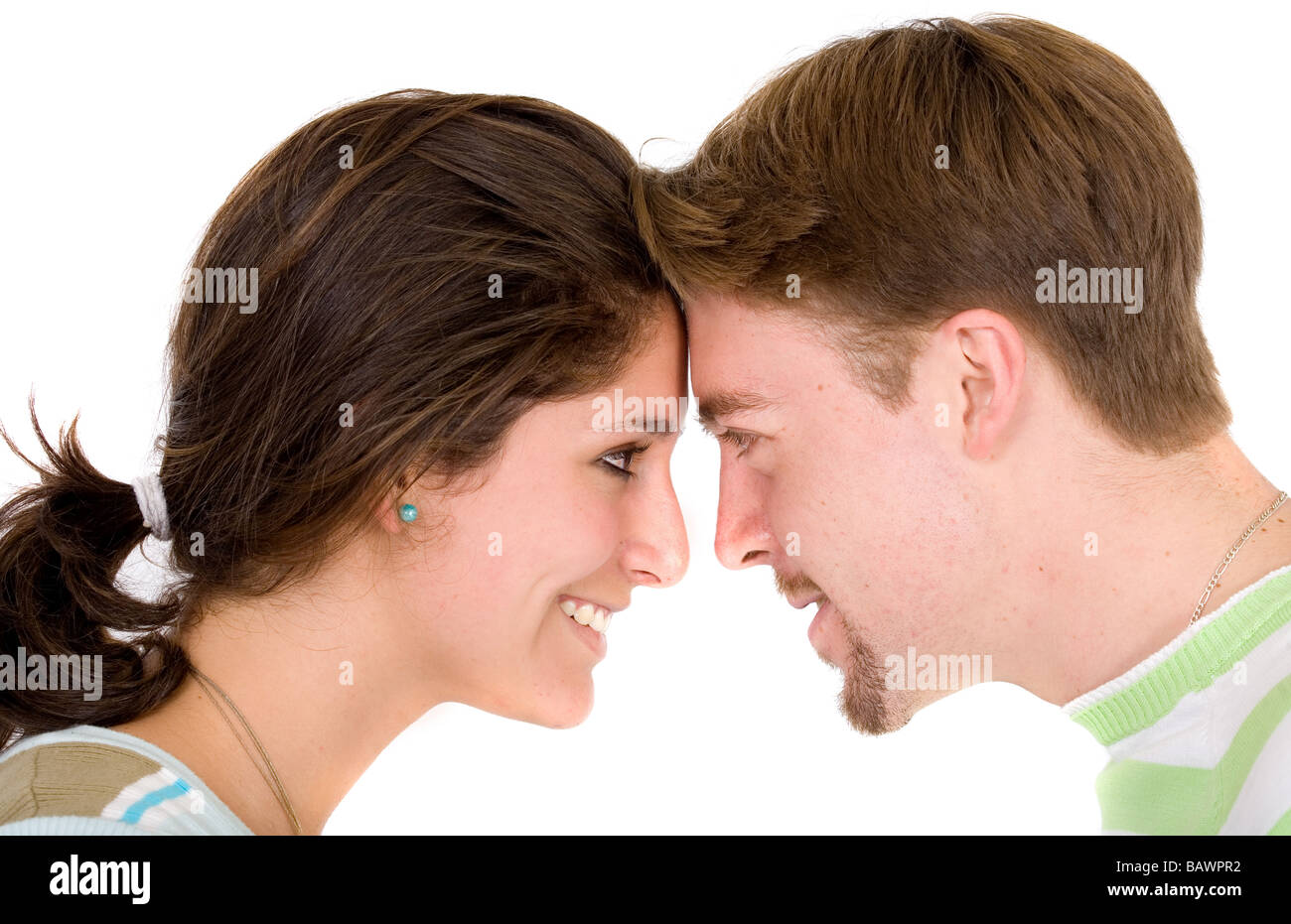 Beautiful couple face to face Stock Photo - Alamy
