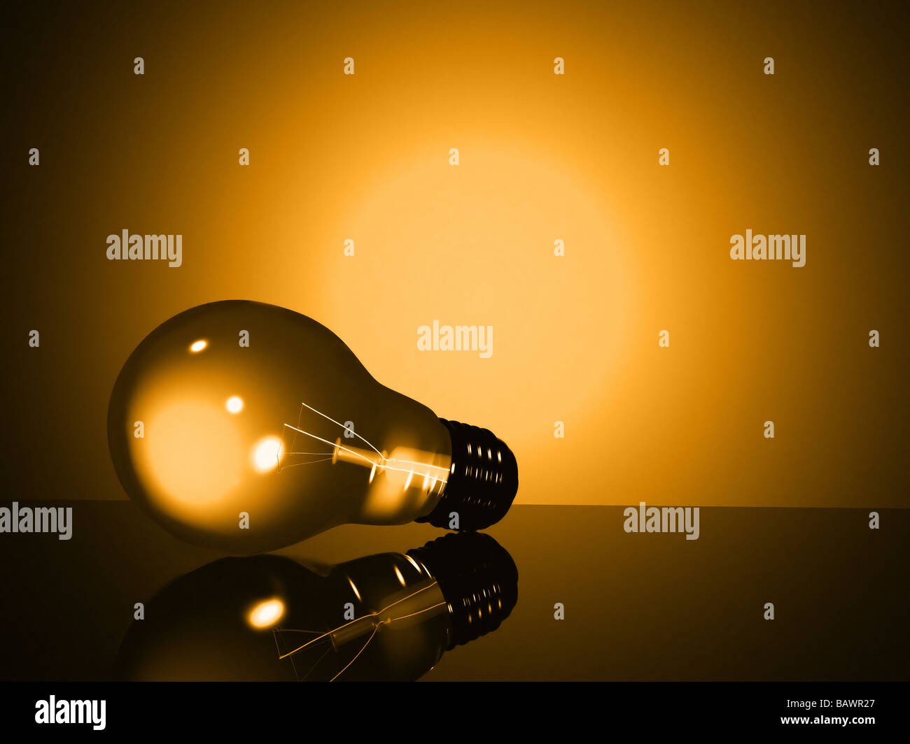yellow light bulb Stock Photo - Alamy