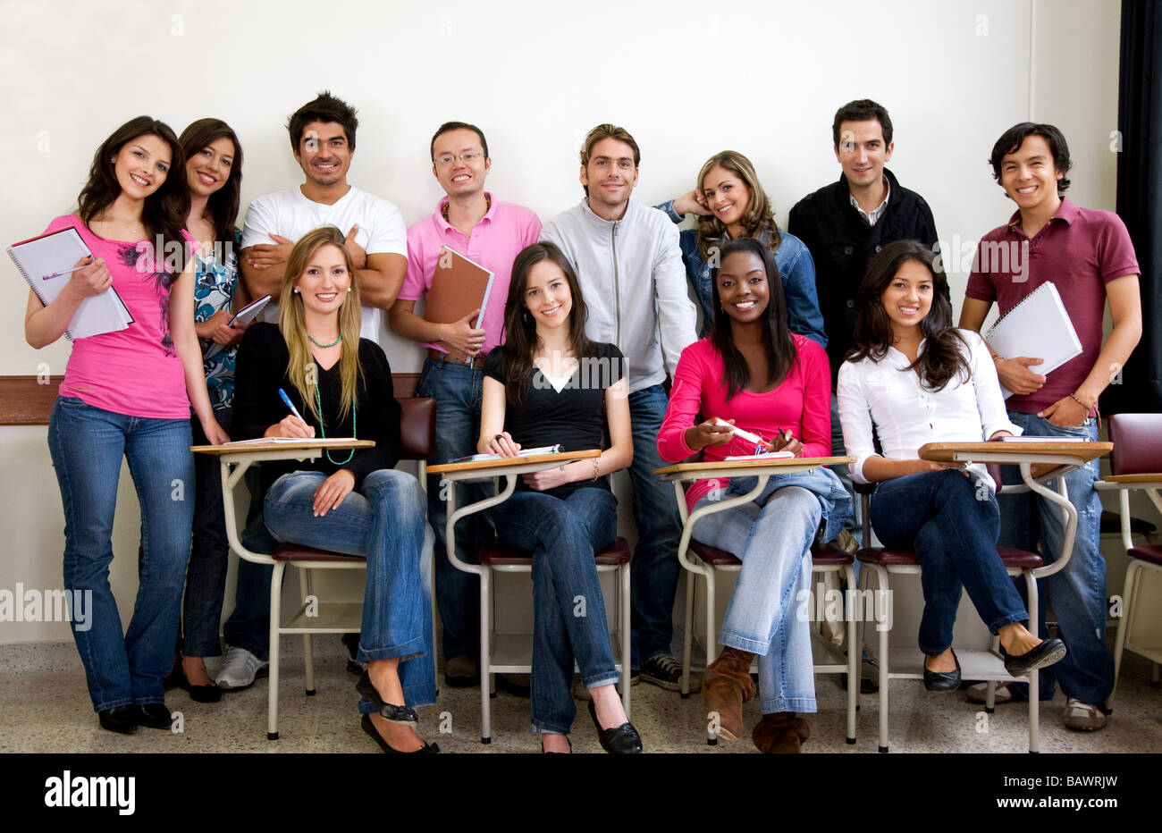 friends or students smiling Stock Photo - Alamy