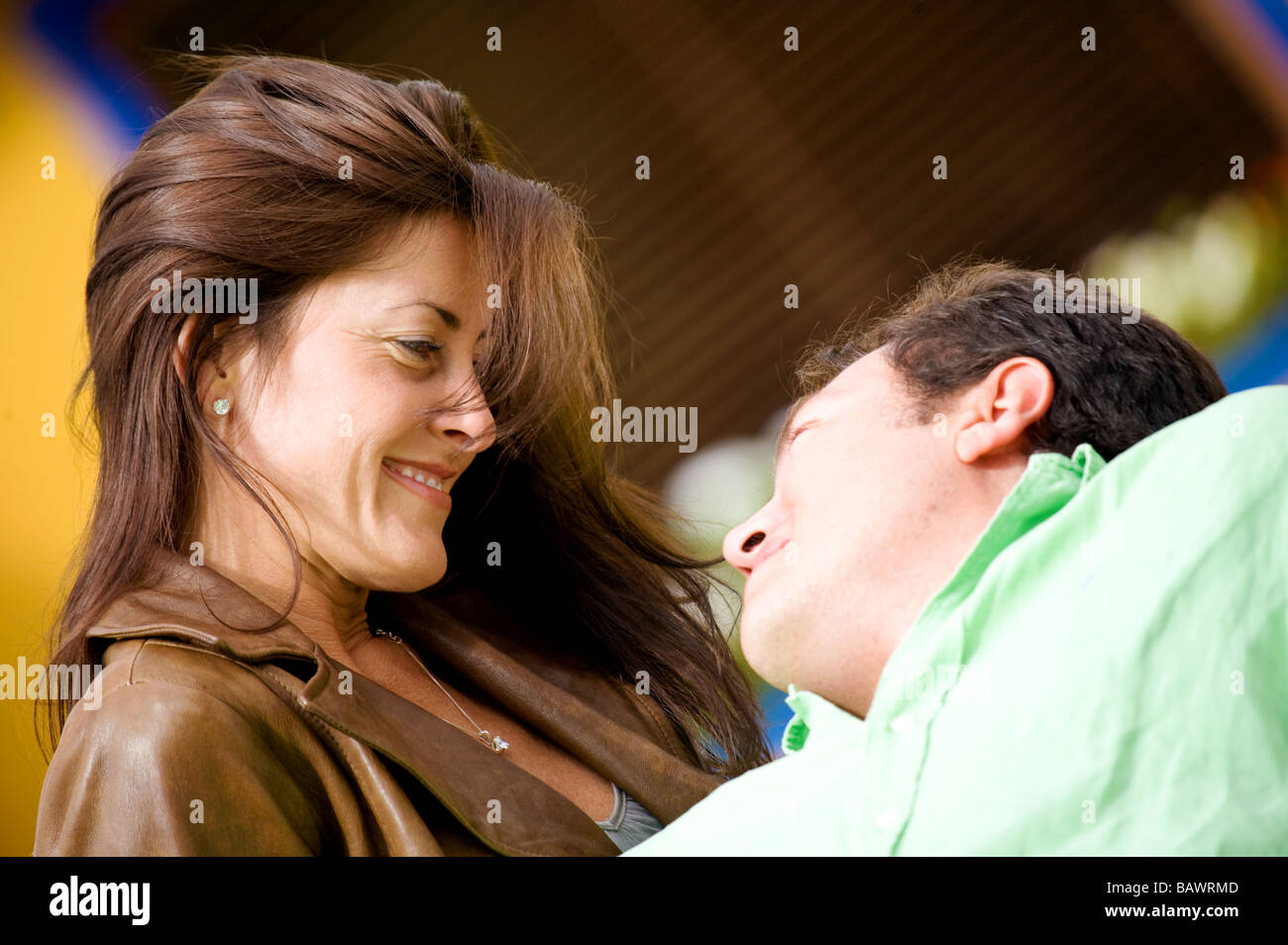 happy couple facing at each other Stock Photo - Alamy