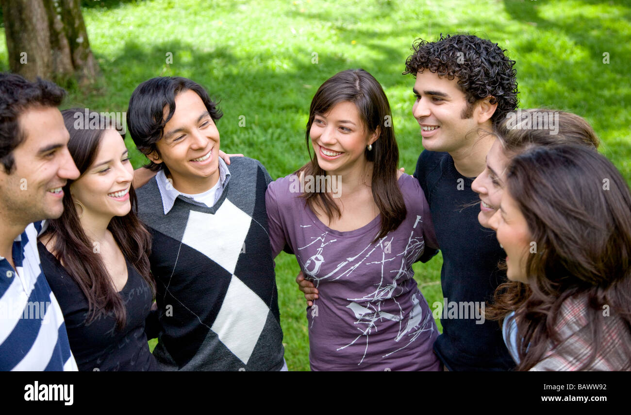 friends or students smiling Stock Photo - Alamy