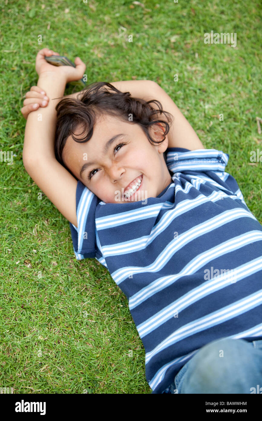 Children on the grass Stock Photo - Alamy