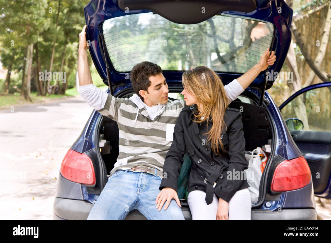 Couple in a car Stock Photo - Alamy