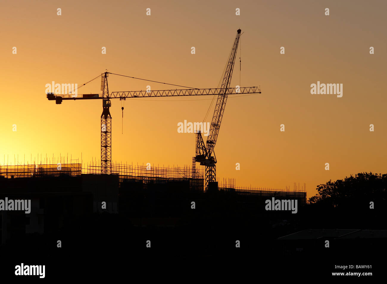Silhouetted tower crane hi-res stock photography and images - Alamy