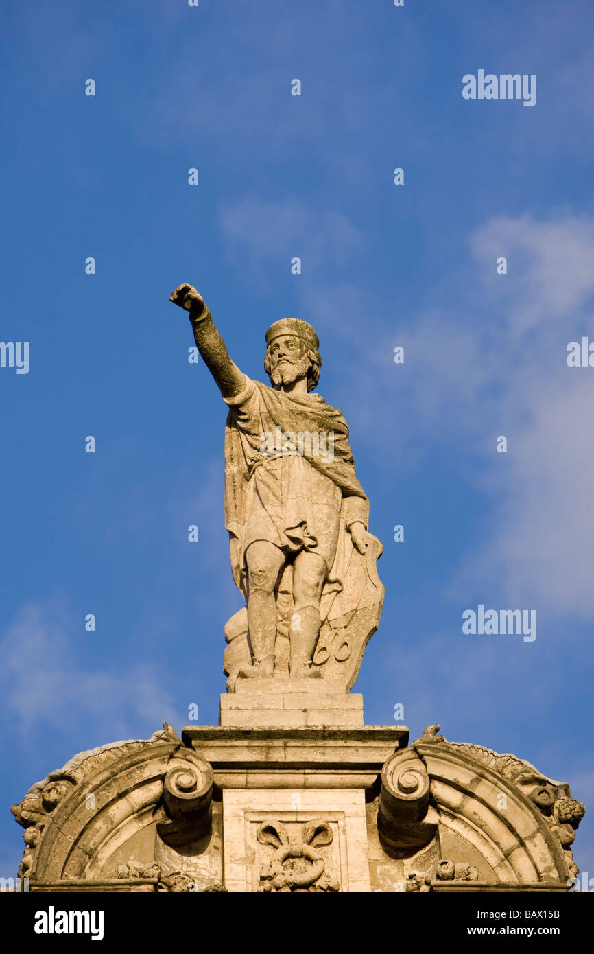 The ornately carved Angel statue (L'ange) above a guild house - Grand ...