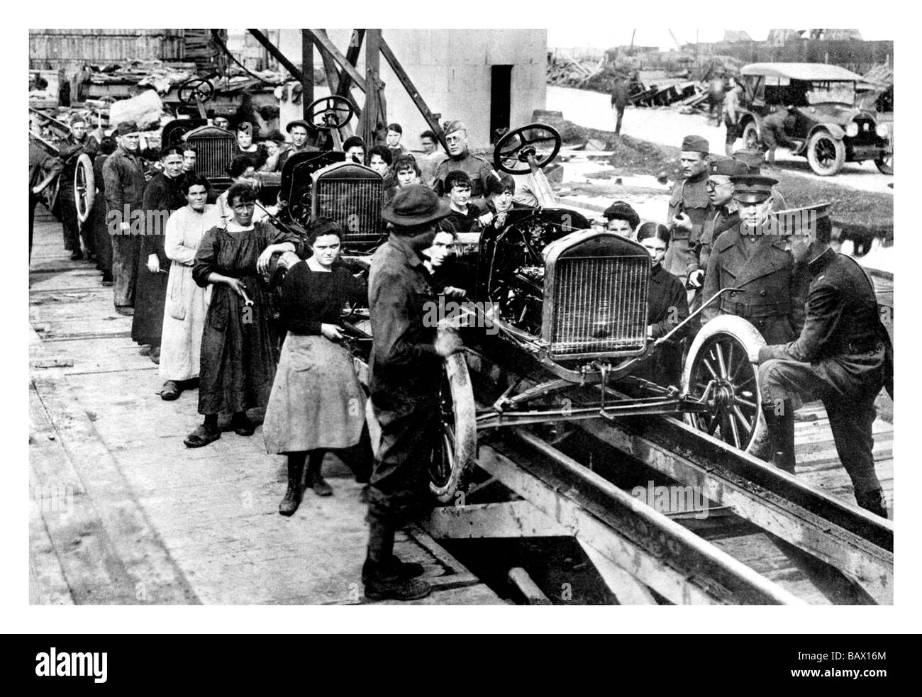 Model T Assembly Line Workers Henry Ford Sits On The Assembly Line In