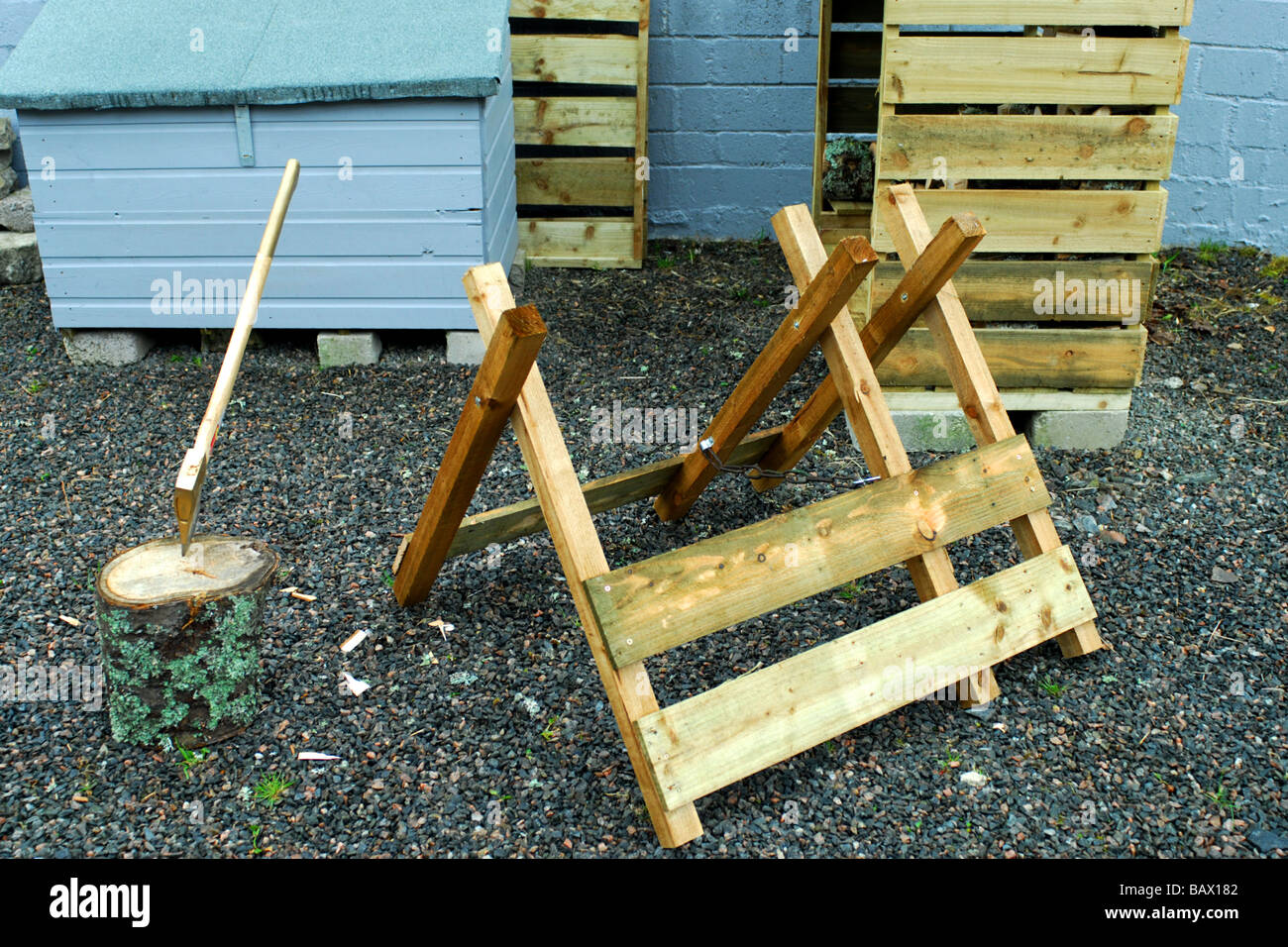 Log store chopping block and axe ready and waiting for some fresh wood ...