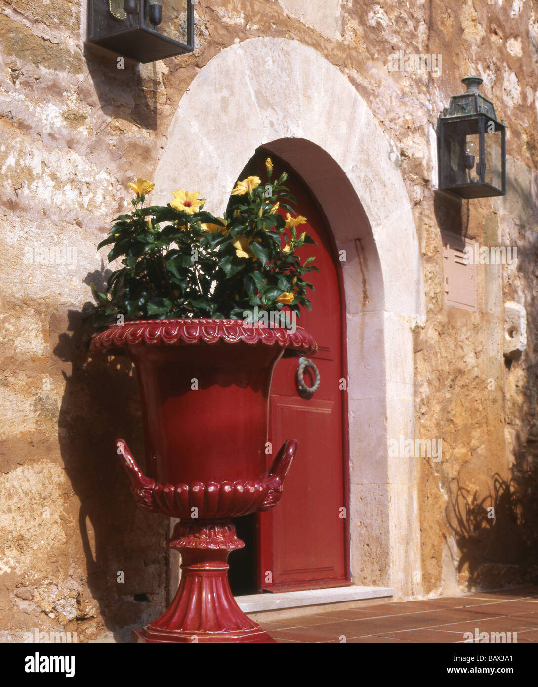 Red gate with Flowers Stock Photo - Alamy