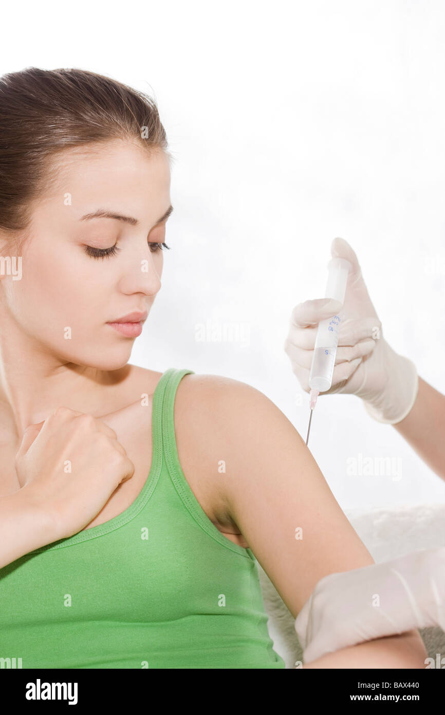 Woman injection arm hi-res stock photography and images - Alamy