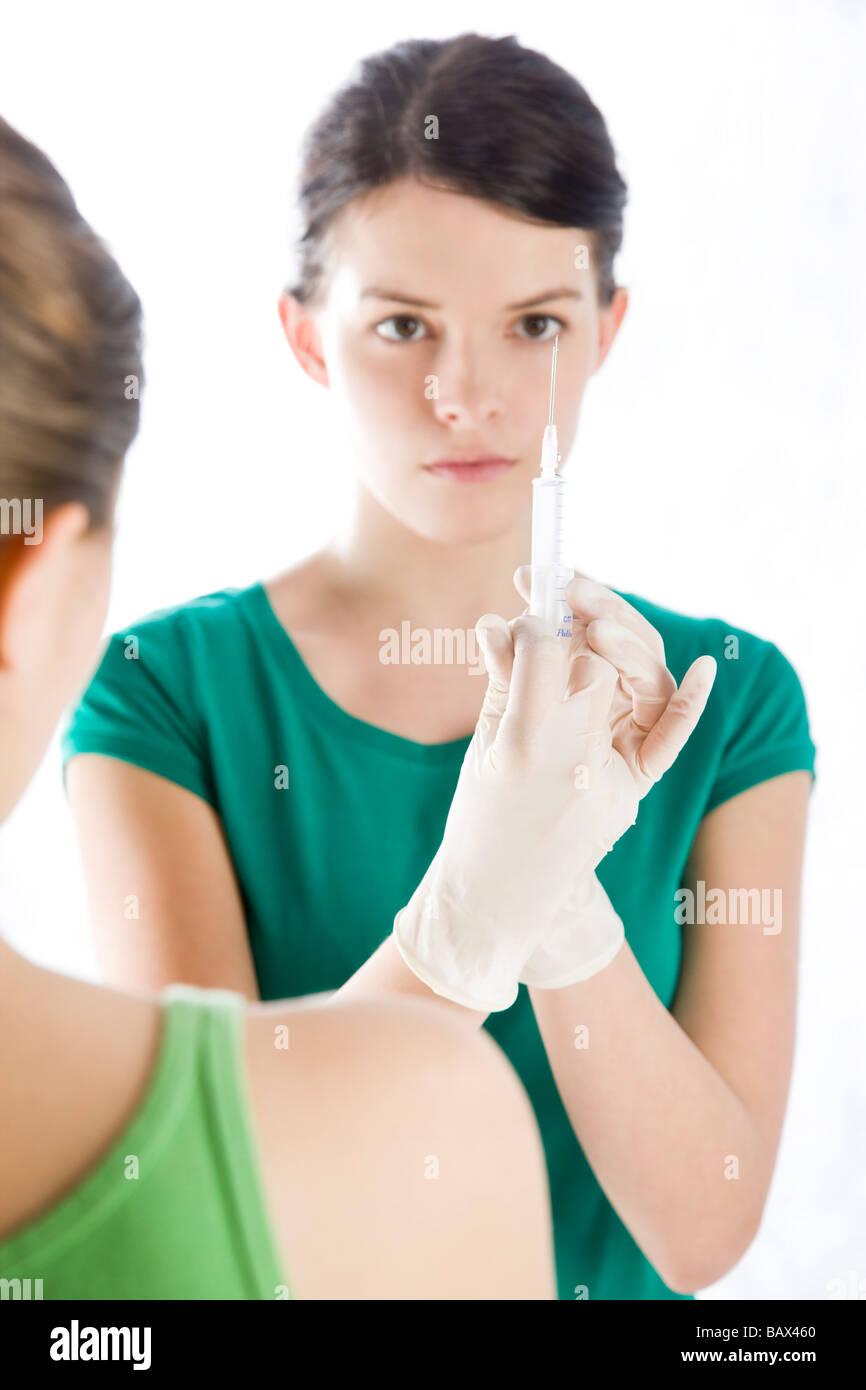 woman going to make injection Stock Photo - Alamy
