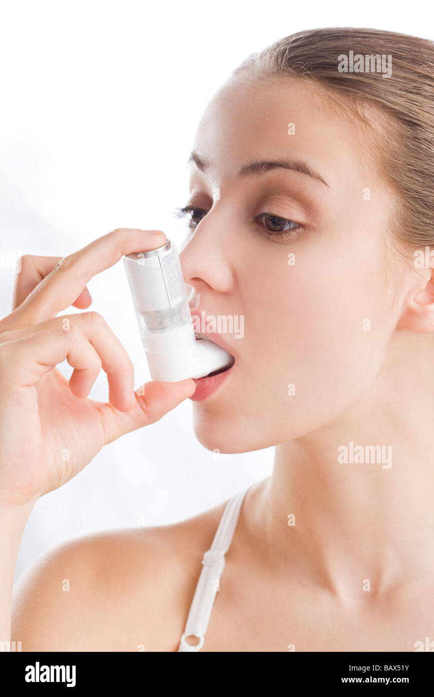 woman using inhaler Stock Photo - Alamy