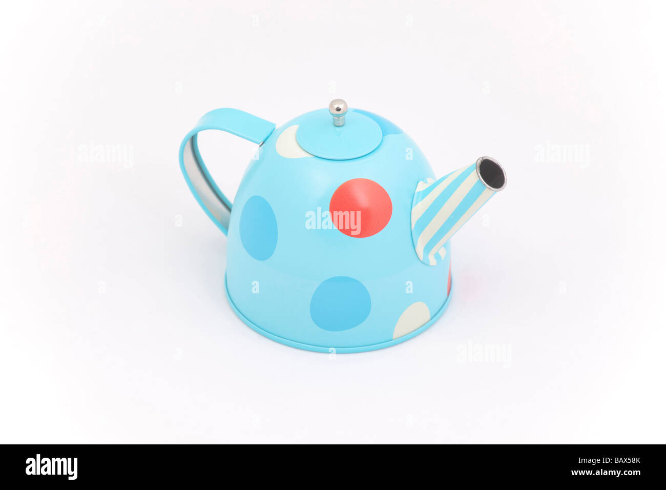 Child s toy teapot against a white background Stock Photo - Alamy