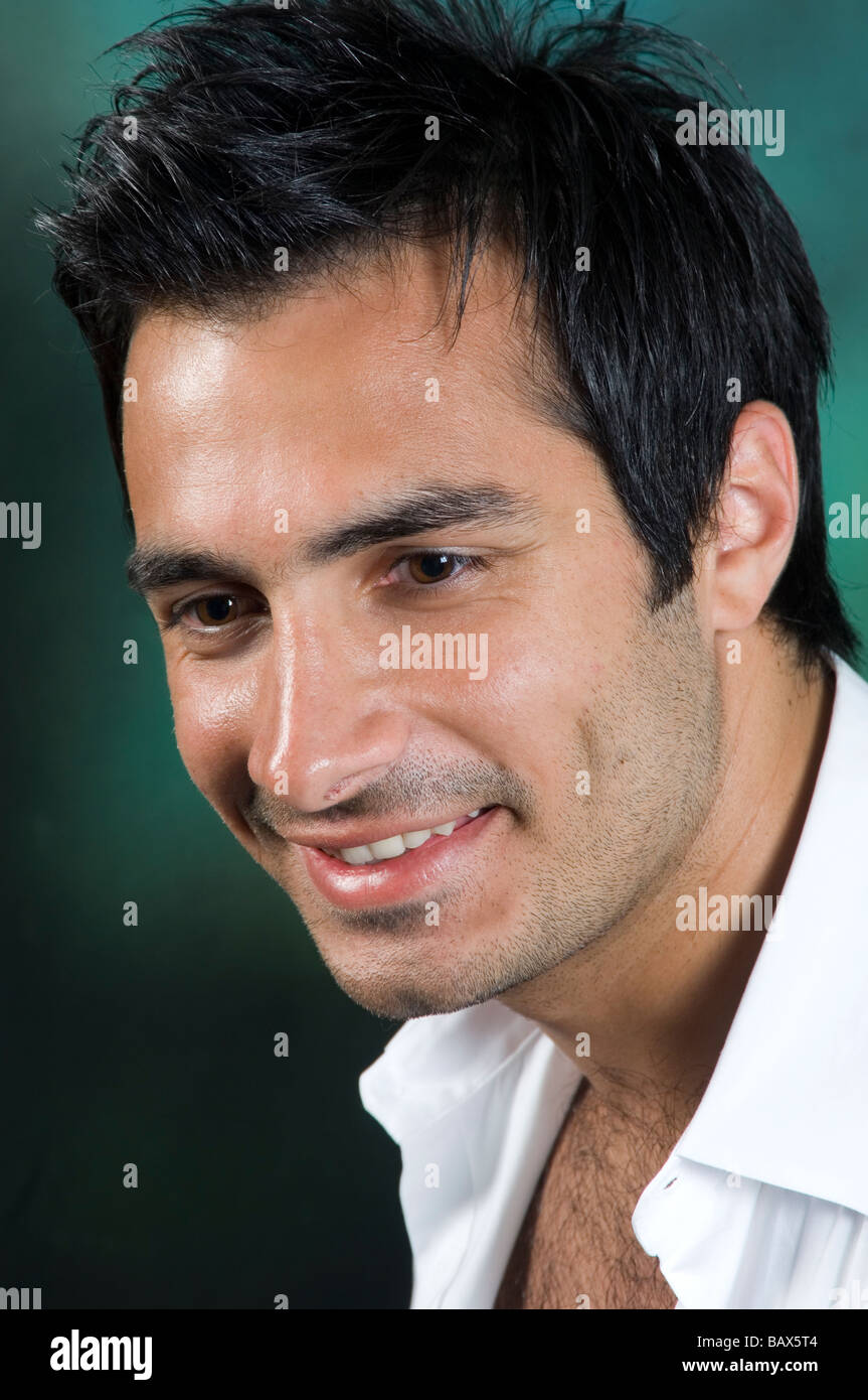 Happy young Asian man Stock Photo - Alamy