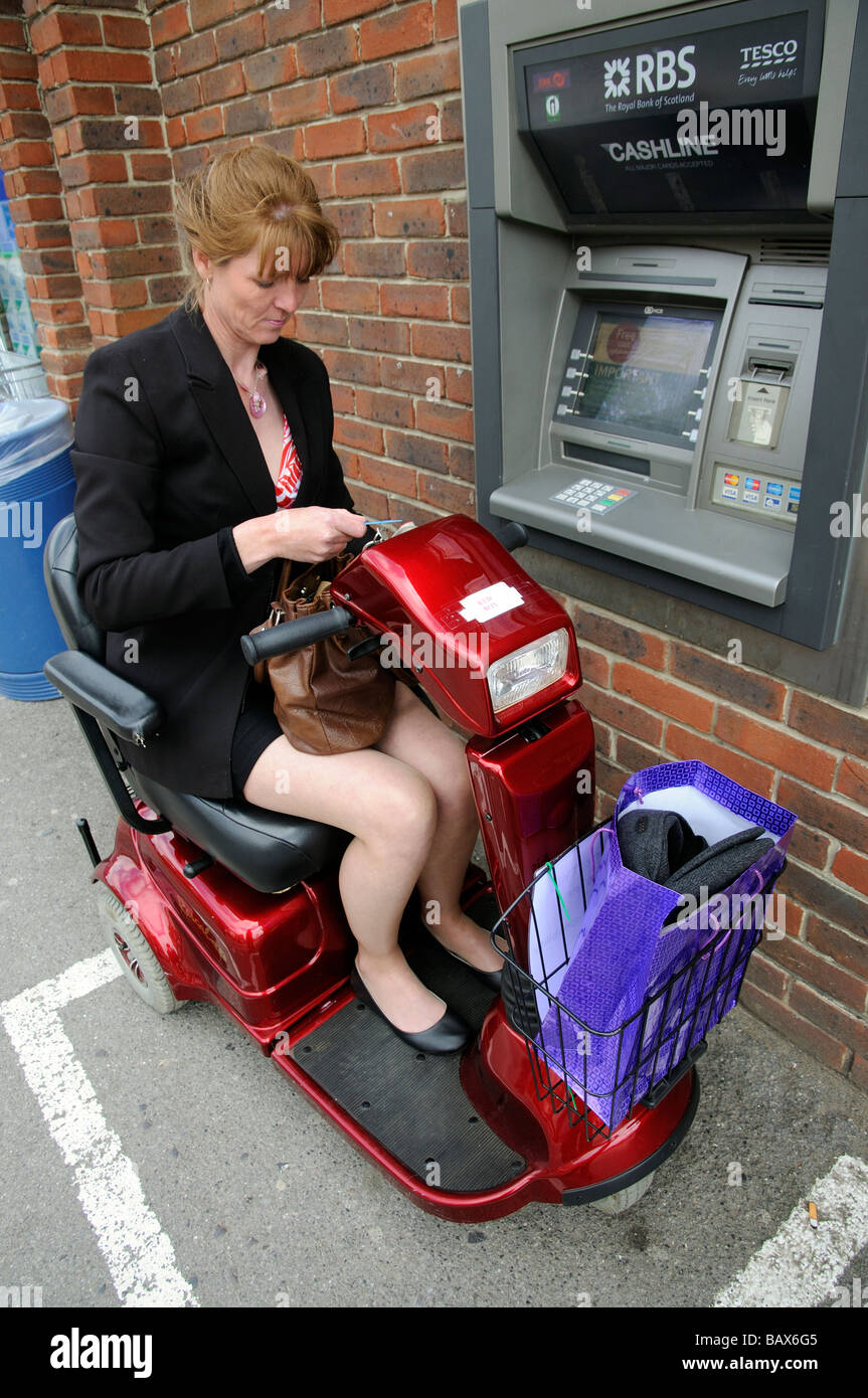 Woman on rascal mobility scooter hi-res stock photography and images ...