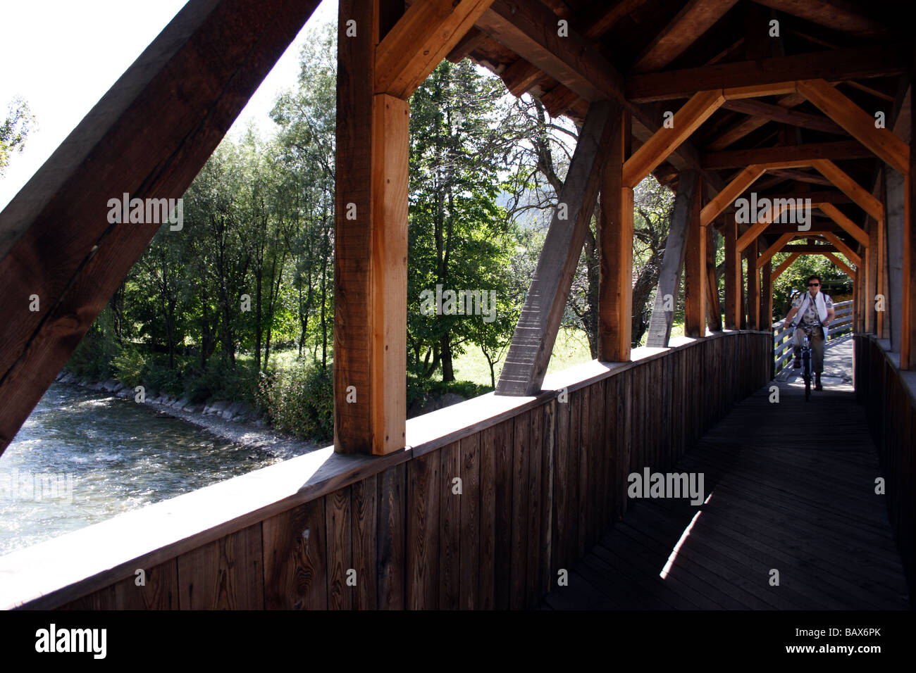 Glorenza (Glurns): crossing the bridge on a bike Stock Photo - Alamy