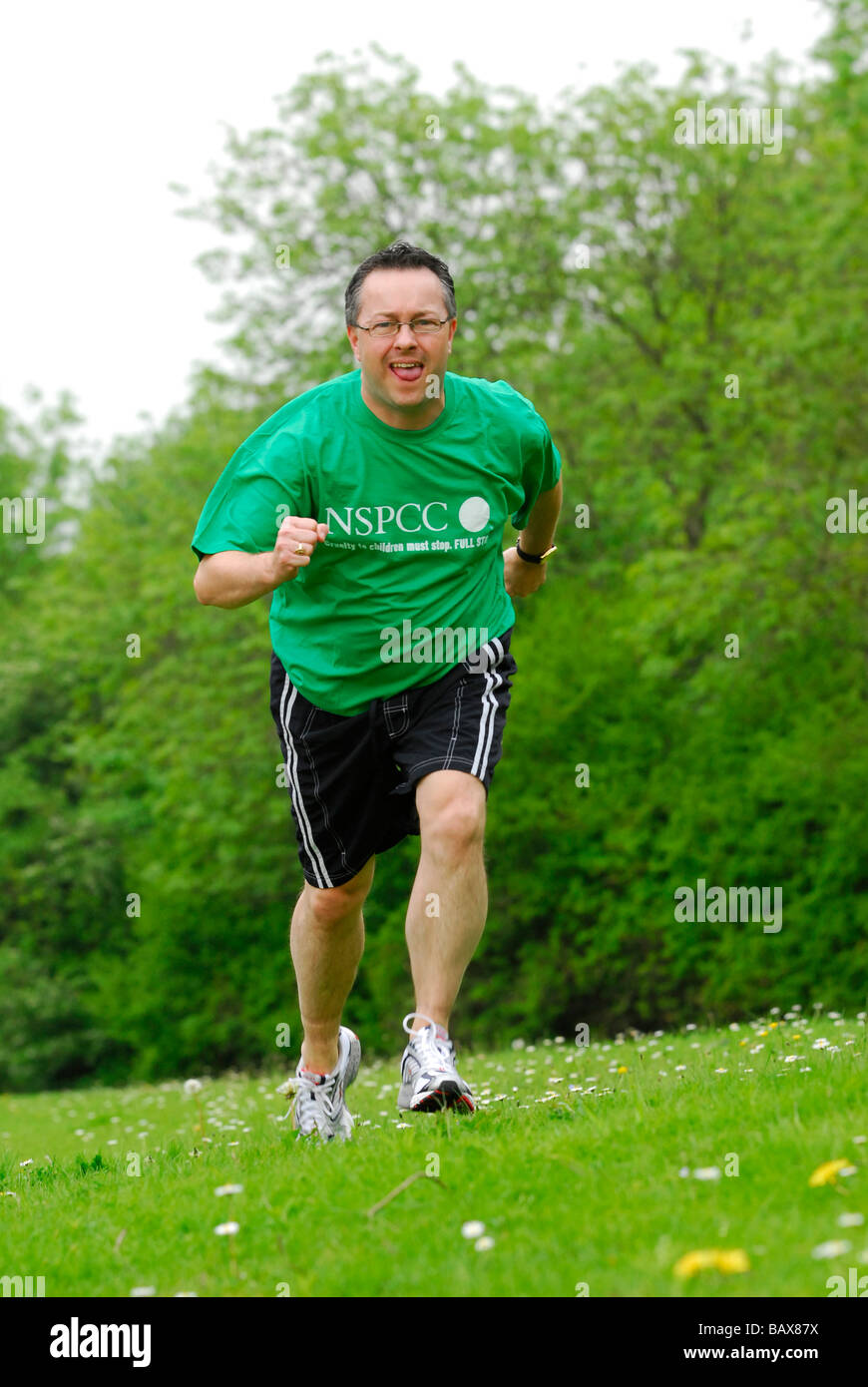 Charity runner in training Stock Photo - Alamy