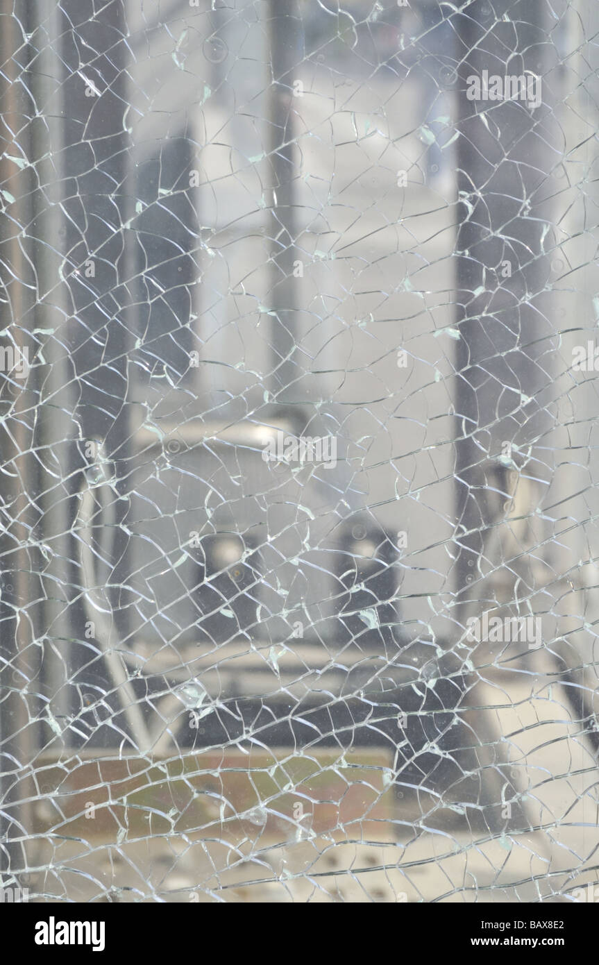 Broken, cracked glass window Stock Photo - Alamy