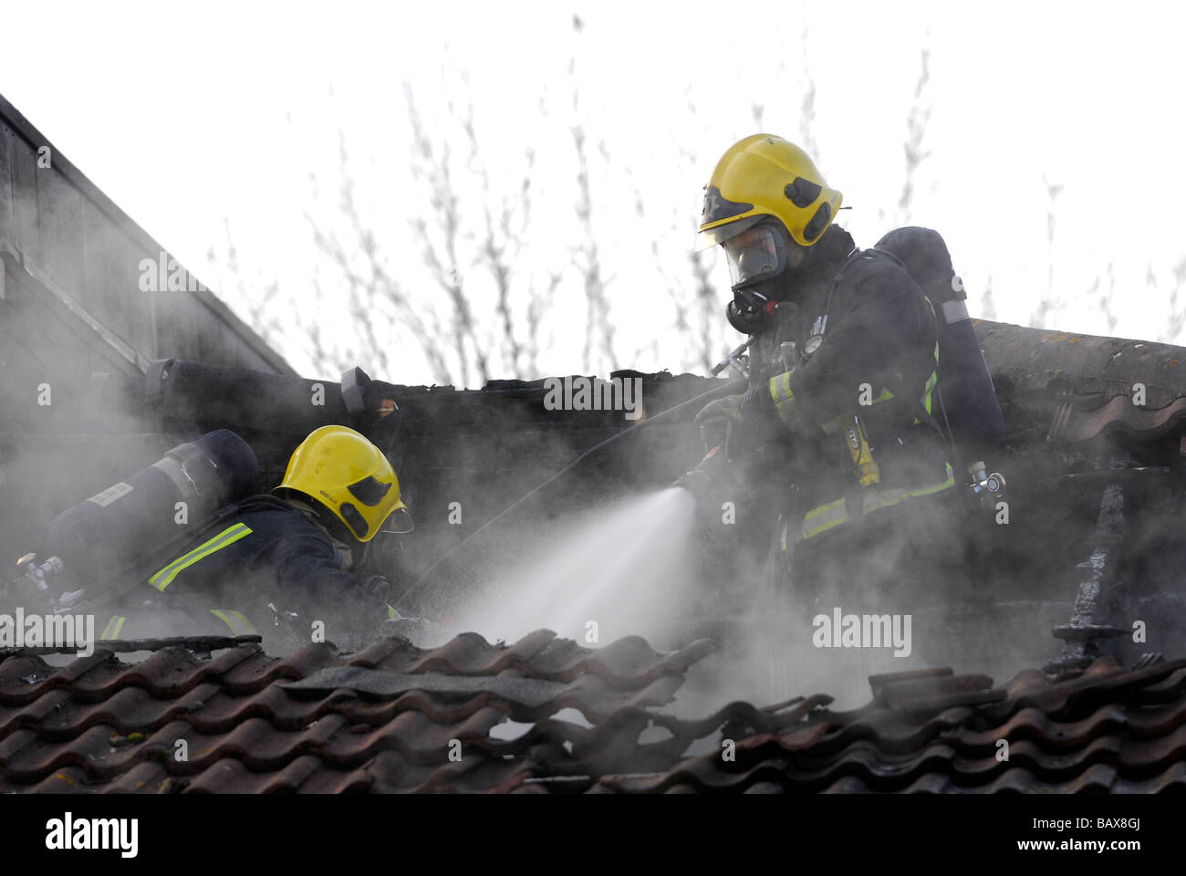 Fireman roof hi-res stock photography and images - Alamy
