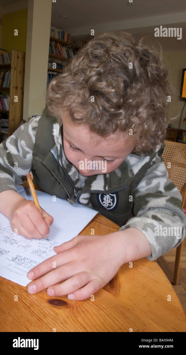 Children drawing and colouring and doing homework at home Stock Photo ...