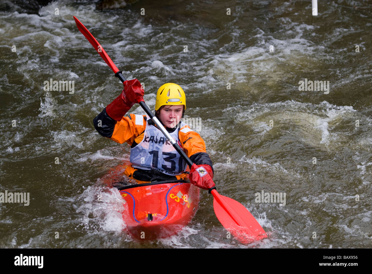 Person competing in a canoe slalom competition Stock Photo - Alamy