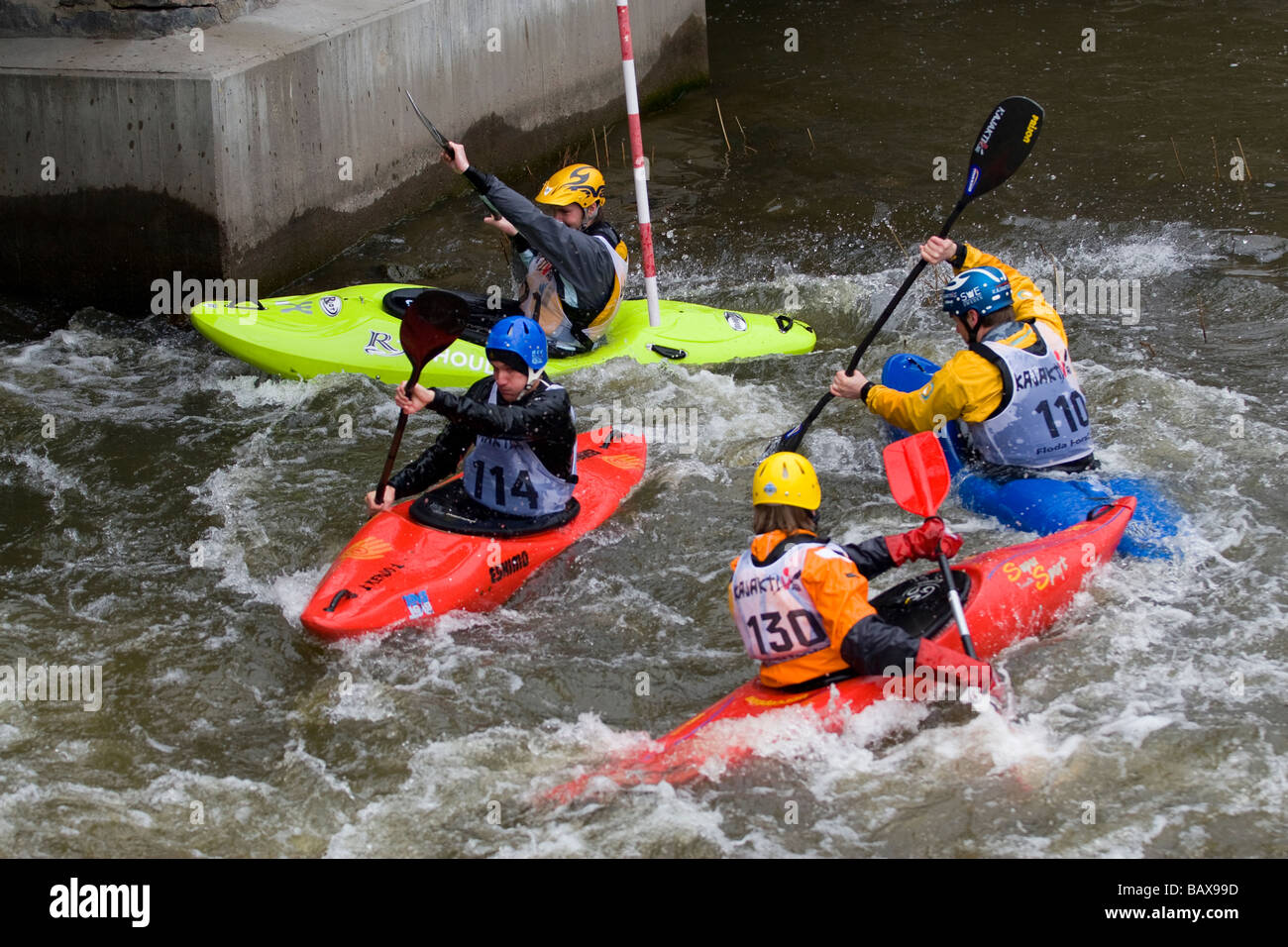 Person competing in a canoe slalom competition Stock Photo - Alamy