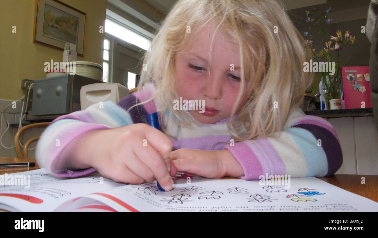 girl drawing and colouring and doing homework at home Stock Photo - Alamy