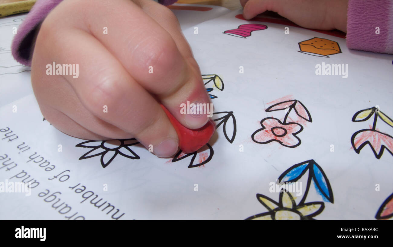 Children drawing and colouring and doing homework at home Stock Photo ...