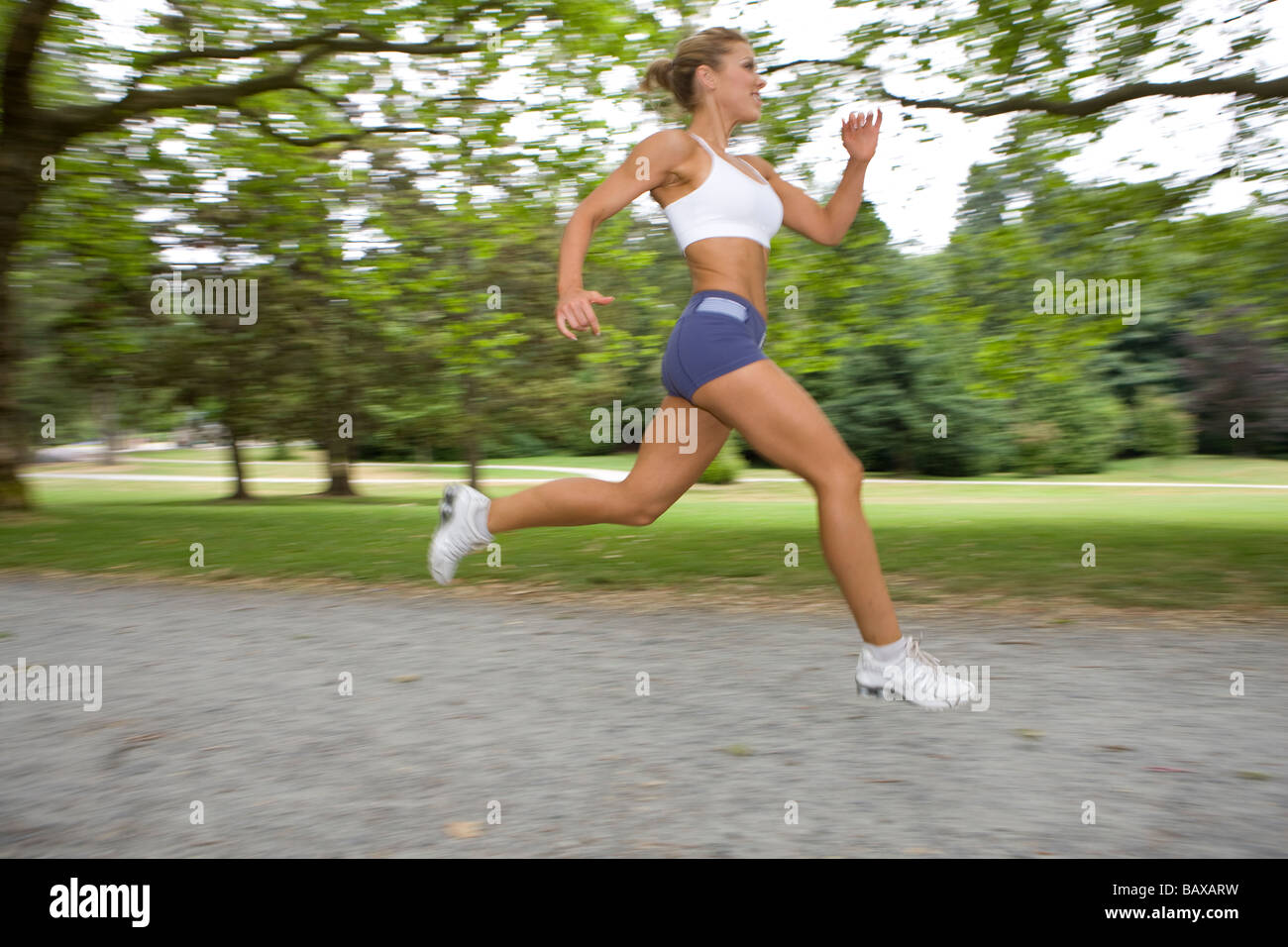 fit girl running in a park Stock Photo - Alamy