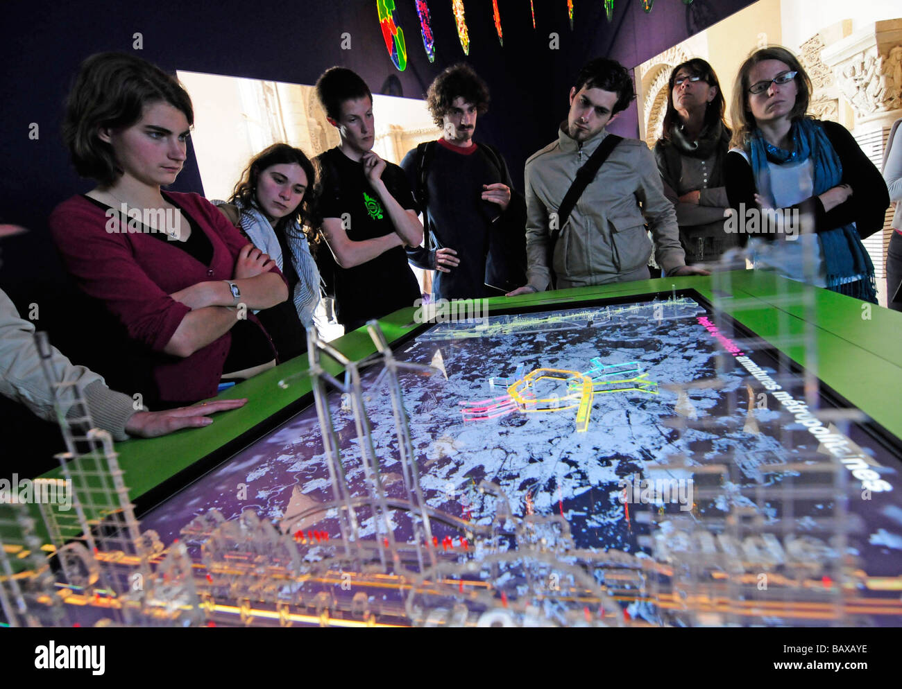 Multimedia display of maps showing the future dimensions of Paris ...